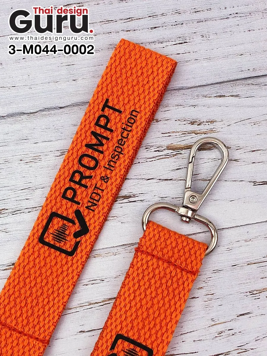 ผลิตพวงกุญแจสายผ้าสปันสีส้ม สกรีนลายหน้าหลังครบรอบ 9 ปี Prompt
