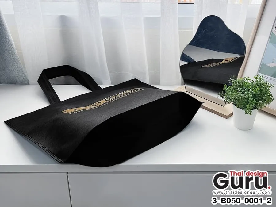 สั่งผลิตกระเป๋าผ้าสปันบอนด์หูหิ้วสีดำ สกรีนลาย แบรนด์ "TOP SECRET"